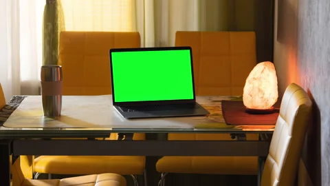 Laptop with green screen and hot drink i... | Stock Video | Pond5