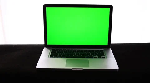 Laptop with Green Screen Isolated on Whi... | Stock Video | Pond5