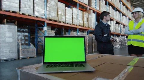 Laptop with Green Screen on Logistics Wa... | Stock Video | Pond5