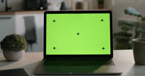 Laptop with green screen on table. Place... | Stock Video | Pond5