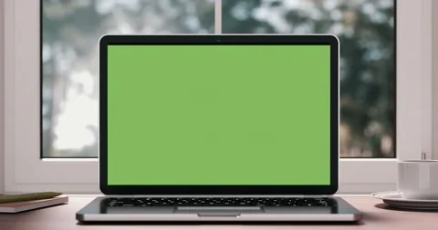 Laptop Mockup with Blank Green Screen in... | Stock Video | Pond5