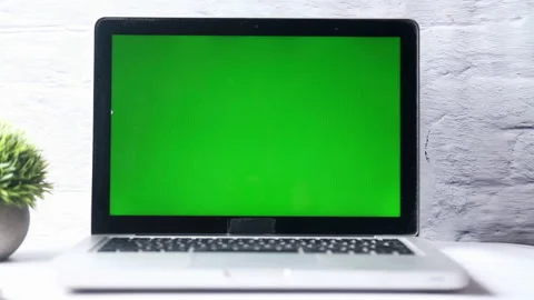 Laptop screen with green display isolate... | Stock Video | Pond5