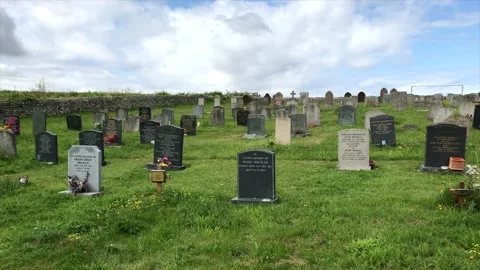 Large cemetery graveyard with grass and ... | Stock Video | Pond5