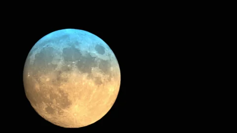 Large Colourful Full Moon Changing Colou... | Stock Video | Pond5