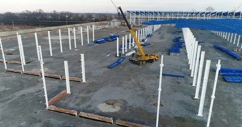 A large construction crane, people worki... | Stock Video | Pond5