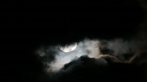 Large creepy full moon breaking through ... | Stock Video | Pond5