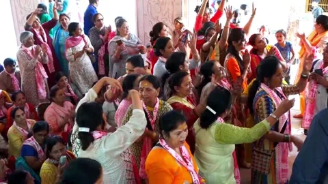 Large Crowd of Devotee's Dancing in a Kr... | Stock Video | Pond5