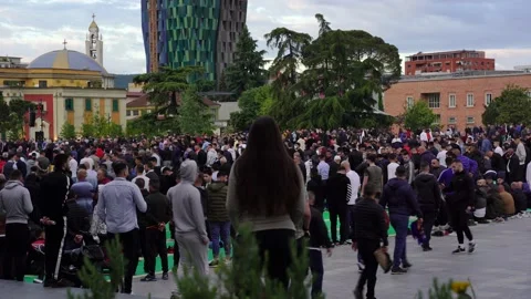Large crowd of people gathering in main ... | Stock Video | Pond5