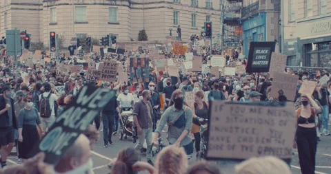Large crowd of people marching with pick... | Stock Video | Pond5