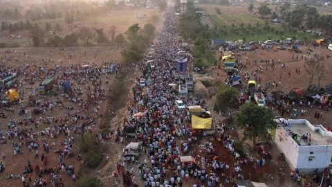 Large crowd of people moving on the road... | Stock Video | Pond5