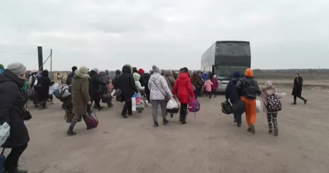 Large crowd of refugees running up to do... | Stock Video | Pond5