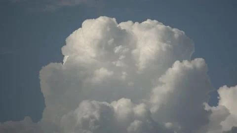 Large cumulus swelling in volume in hot ... | Stock Video | Pond5