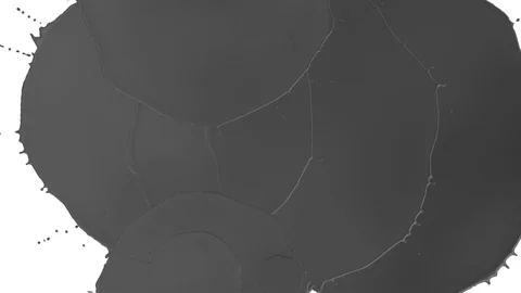 Large drops of liquid metal fall on the ... | Stock Video | Pond5