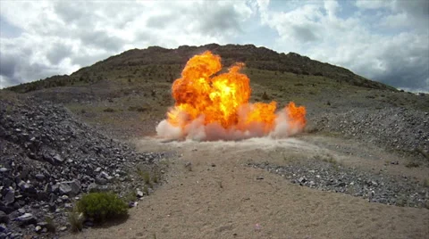 Large fiery explosion at blasting area. | Stock Video | Pond5