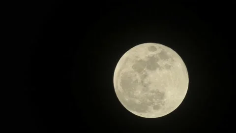 Large full moon moves across the sky, ti... | Stock Video | Pond5