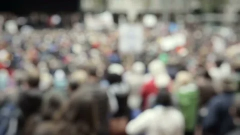 A large gathering of people in a downtow... | Stock Video | Pond5