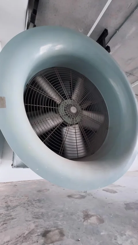 A large, gray, industrial fan is suspend... | Stock Video | Pond5