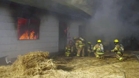 Large group of firemen get ready to ente... | Stock Video | Pond5