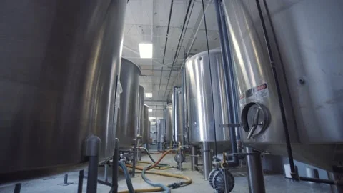 Large industrial tanks for liquid produc... | Stock Video | Pond5