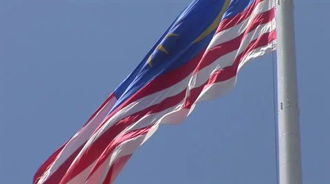 Large Malaysian flag flying in Merdeka S... | Stock Video | Pond5