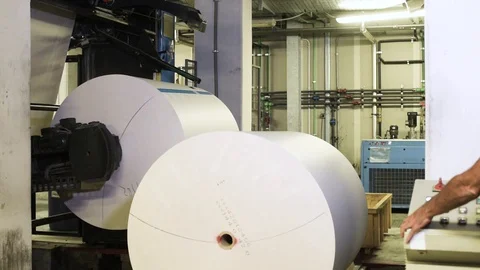 Large paper rolls moving inside a print ... | Stock Video | Pond5