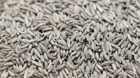 a large pile of natural dried cumin seed... | Stock Video | Pond5