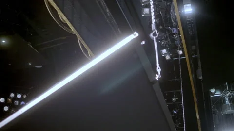 Large projection screen hoisted up on th... | Stock Video | Pond5