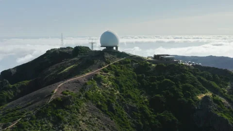 A large radar dome facility at the top o... | Stock Video | Pond5
