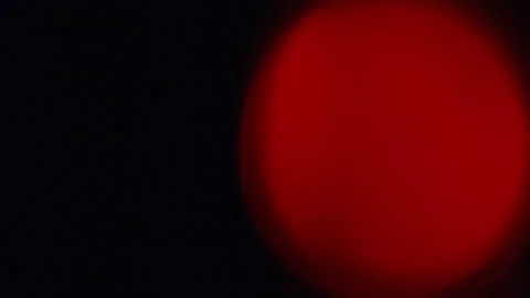Large red out of focus round light leak ... | Stock Video | Pond5