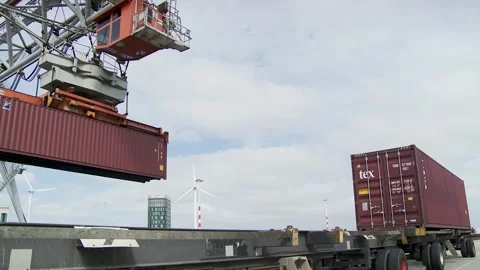 A large red "Tex" shipping container is ... | Stock Video | Pond5