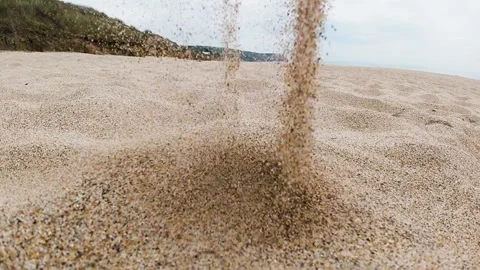Large Sand Grains Falling in Ultra Slow ... | Stock Video | Pond5