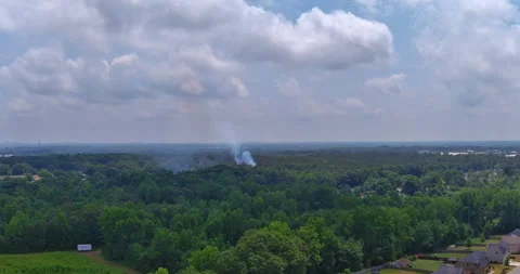 Large smoke plume from forest fire in Ca... | Stock Video | Pond5