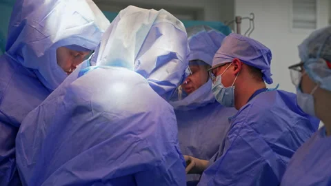 Large surgical team performing knee join... | Stock Video | Pond5