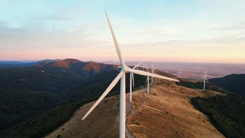 Large wind turbines with blades in mount... | Stock Video | Pond5