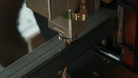 Laser cut head machine while cutting the... | Stock Video | Pond5