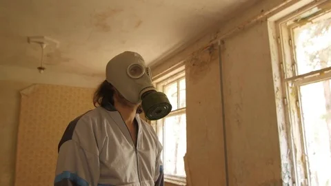 The last man on earth wearing a gas mask | Stock Video | Pond5