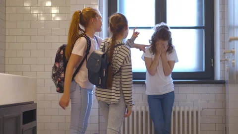 Laughing caucasian bullies scoffing scho... | Stock Video | Pond5