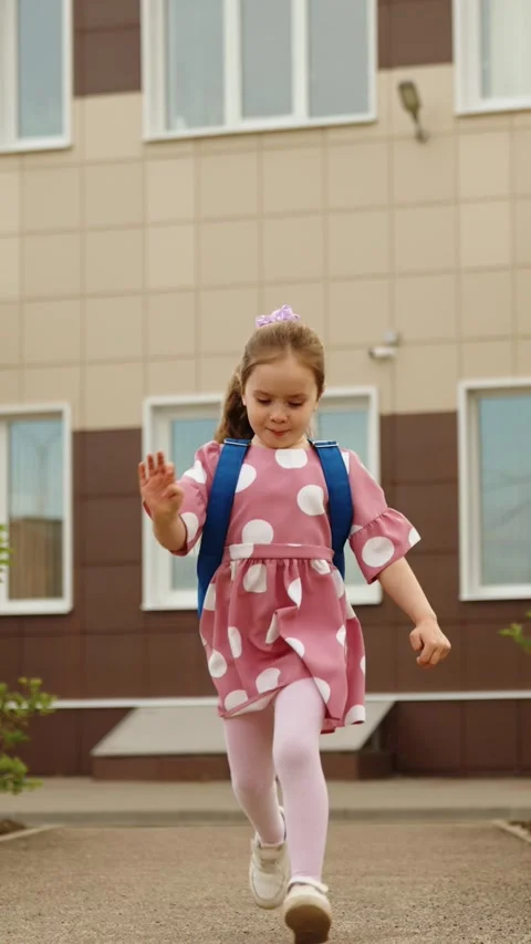 Laughing cute little girl running with t... | Stock Video | Pond5