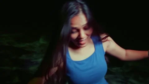 laughing women scared of ocean wave on t... | Stock Video | Pond5