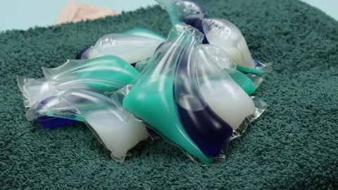 laundry wash capsules, close-up, lying o... | Stock Video | Pond5