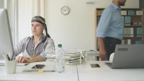 Lazy office worker suffering from the he... | Stock Video | Pond5