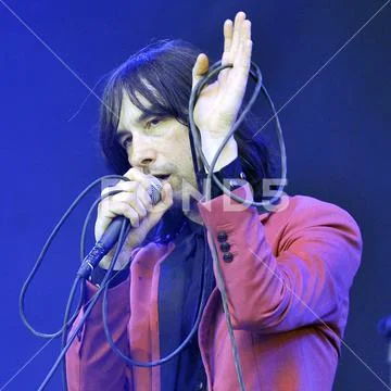 Lead Singer Bobby Gillespie Of Primal Scream Play The Pyramid Stage ...