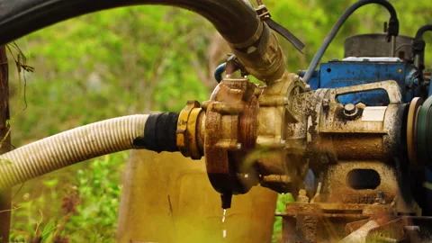 Leaking rusty old water pump working wit... | Stock Video | Pond5
