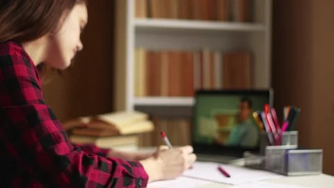 learn virtual. a teenager girl is studyi... | Stock Video | Pond5