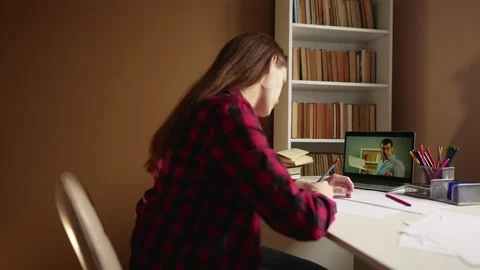 learn virtual. a teenager girl is studyi... | Stock Video | Pond5