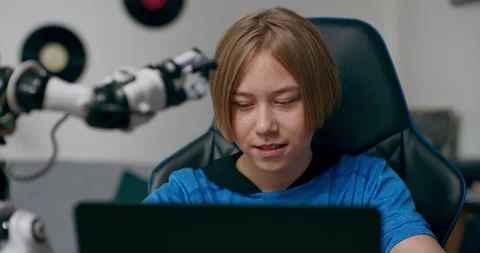 Learning robotics. A young boy works on ... | Stock Video | Pond5