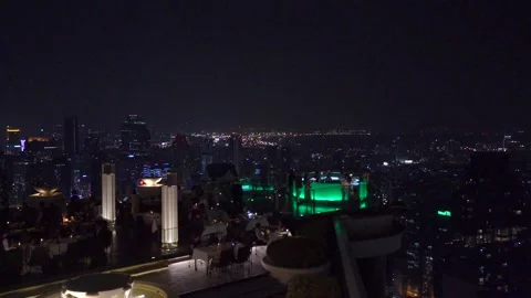 Lebua Rooftop Sky Bar at night with Urba... | Stock Video | Pond5