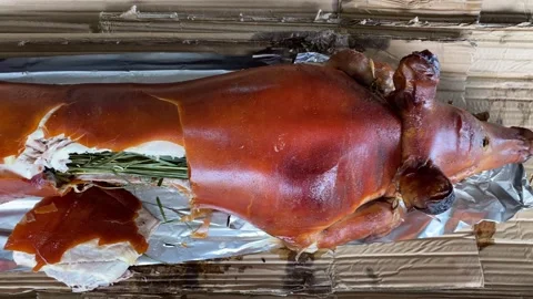 Lechon is a traditional Filipino dish. W... | Stock Video | Pond5