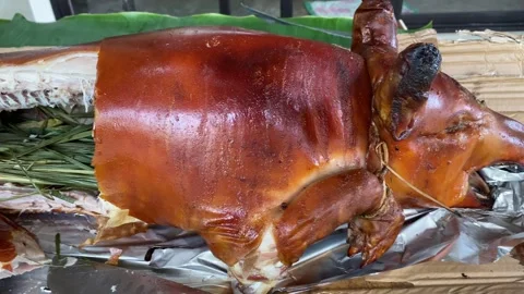 Lechon is a traditional Filipino dish. W... | Stock Video | Pond5