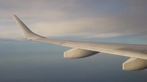 left wing of an airplane view from insid... | Stock Video | Pond5